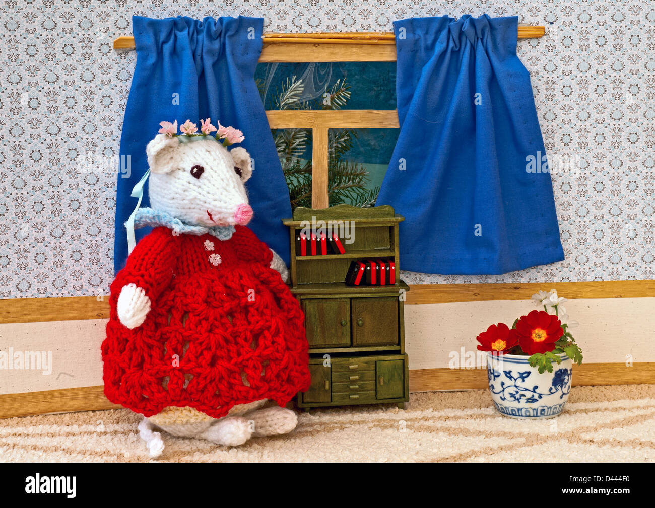 Toy white mouse in a room setting Stock Photo - Alamy