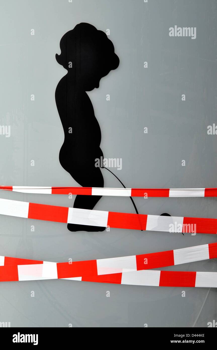 View of a public urinal, a City Pissoir, with the image of the Belgian ...