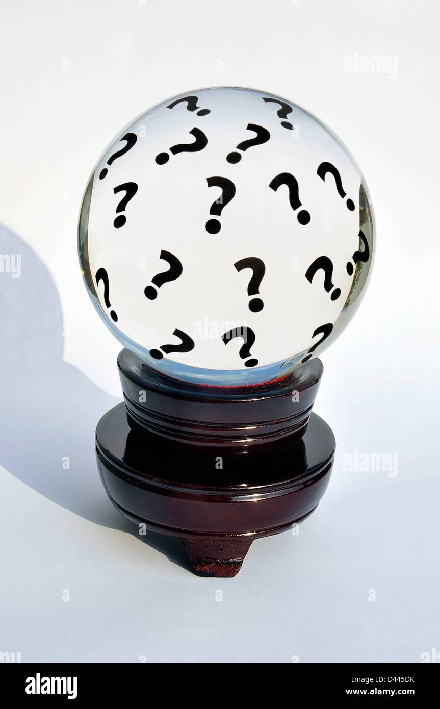 Illustration - A glass ball shows question marks on 11 July 2011. Photo ...