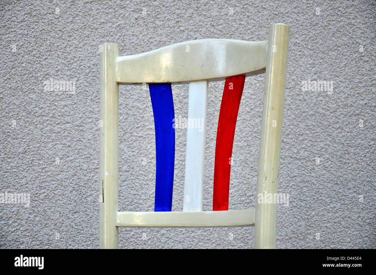 View of the back of a chair painted in the French national colors in ...