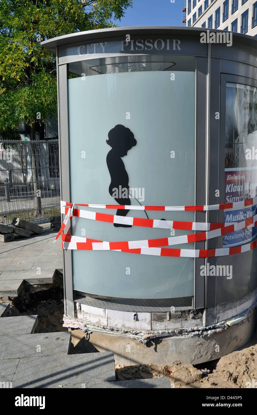 View of a public urinal, a City Pissoir, with the image of the Belgian ...