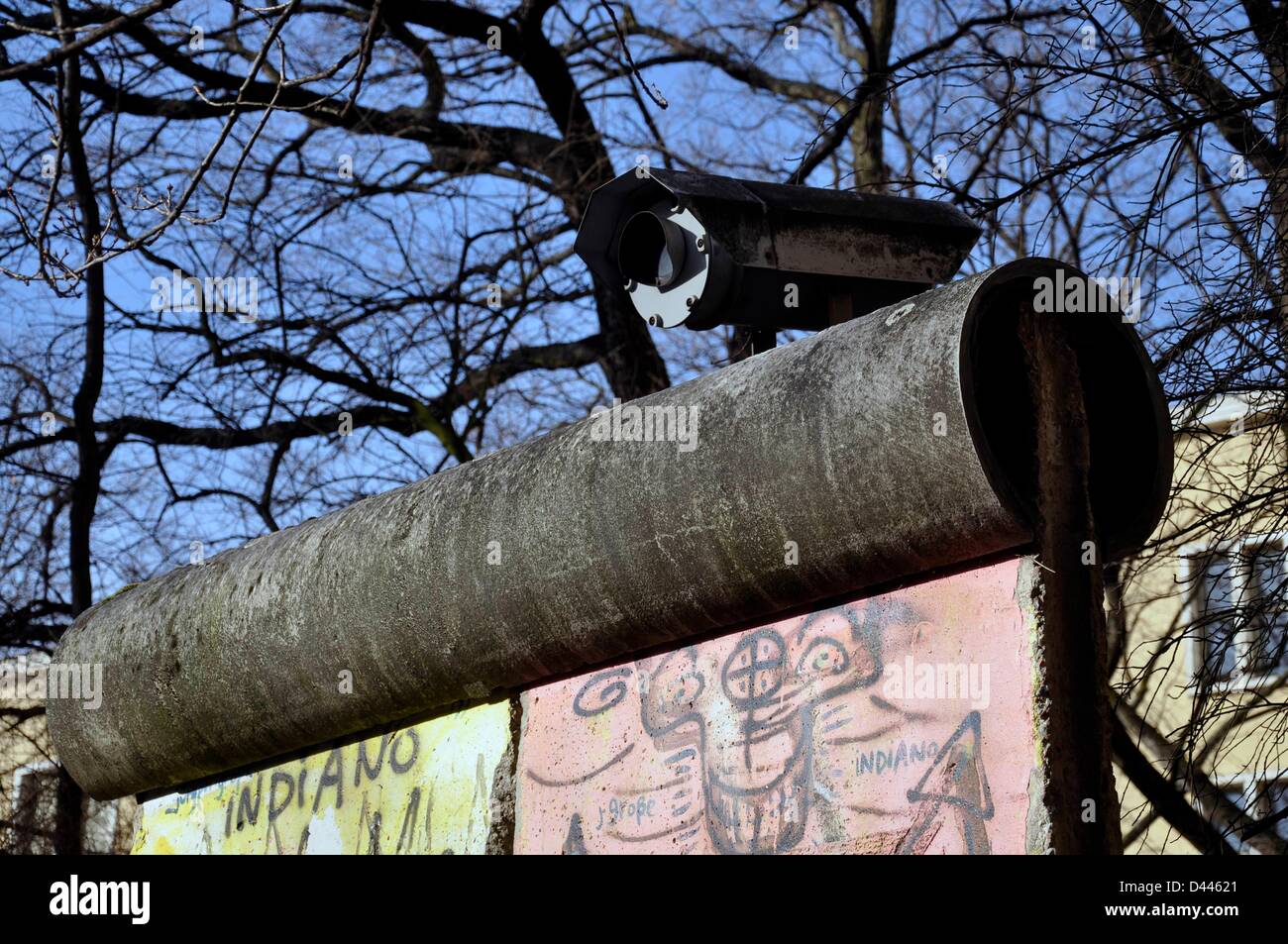 A remnant of the Berlin Wall with a surveillance camera on 05 March ...