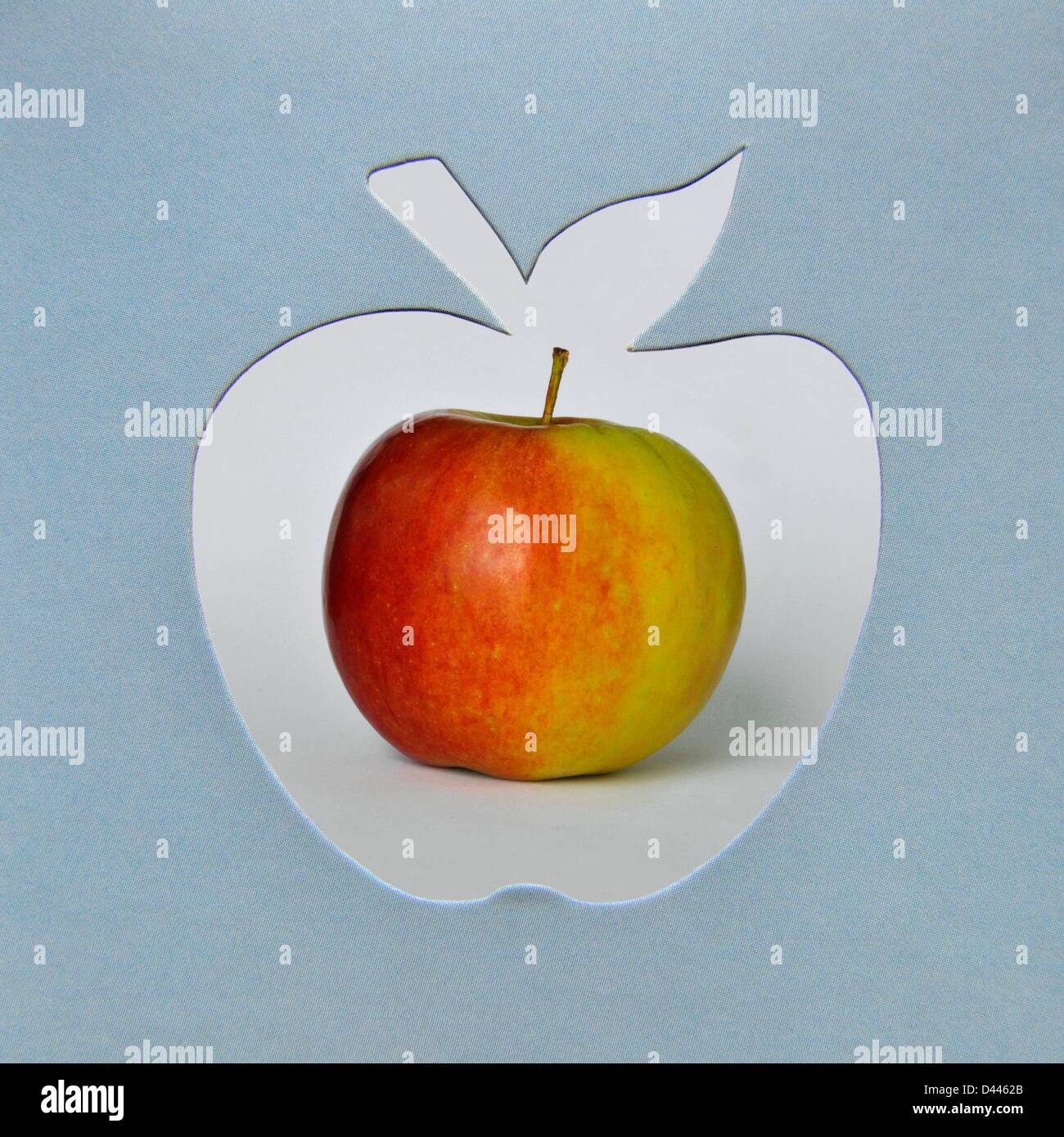 Illustration - An apple is pictured in an apple stencil in Berlin ...