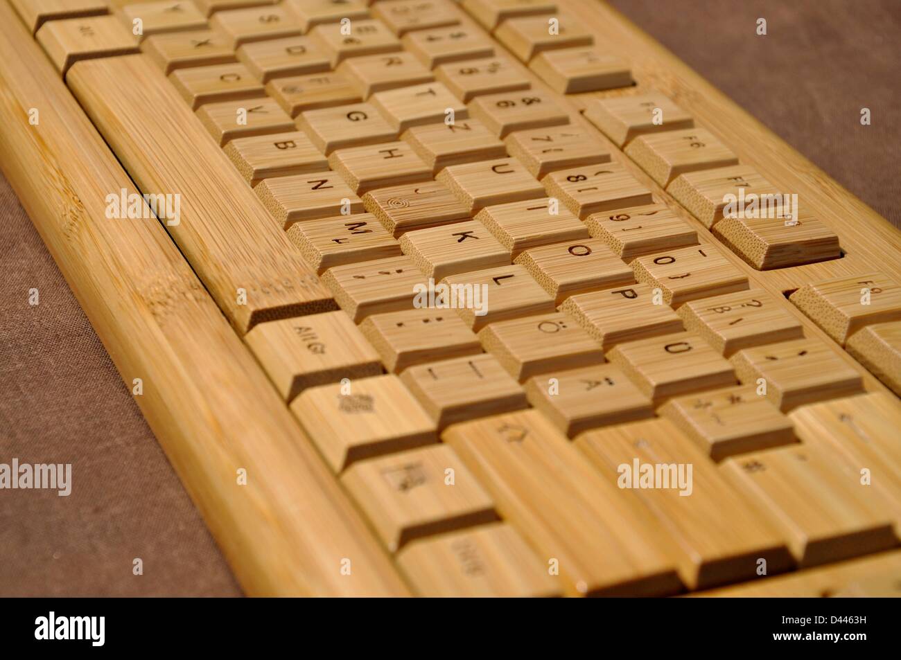 Illustration - A PC keyboard made from bamboo is pictured on a table in ...
