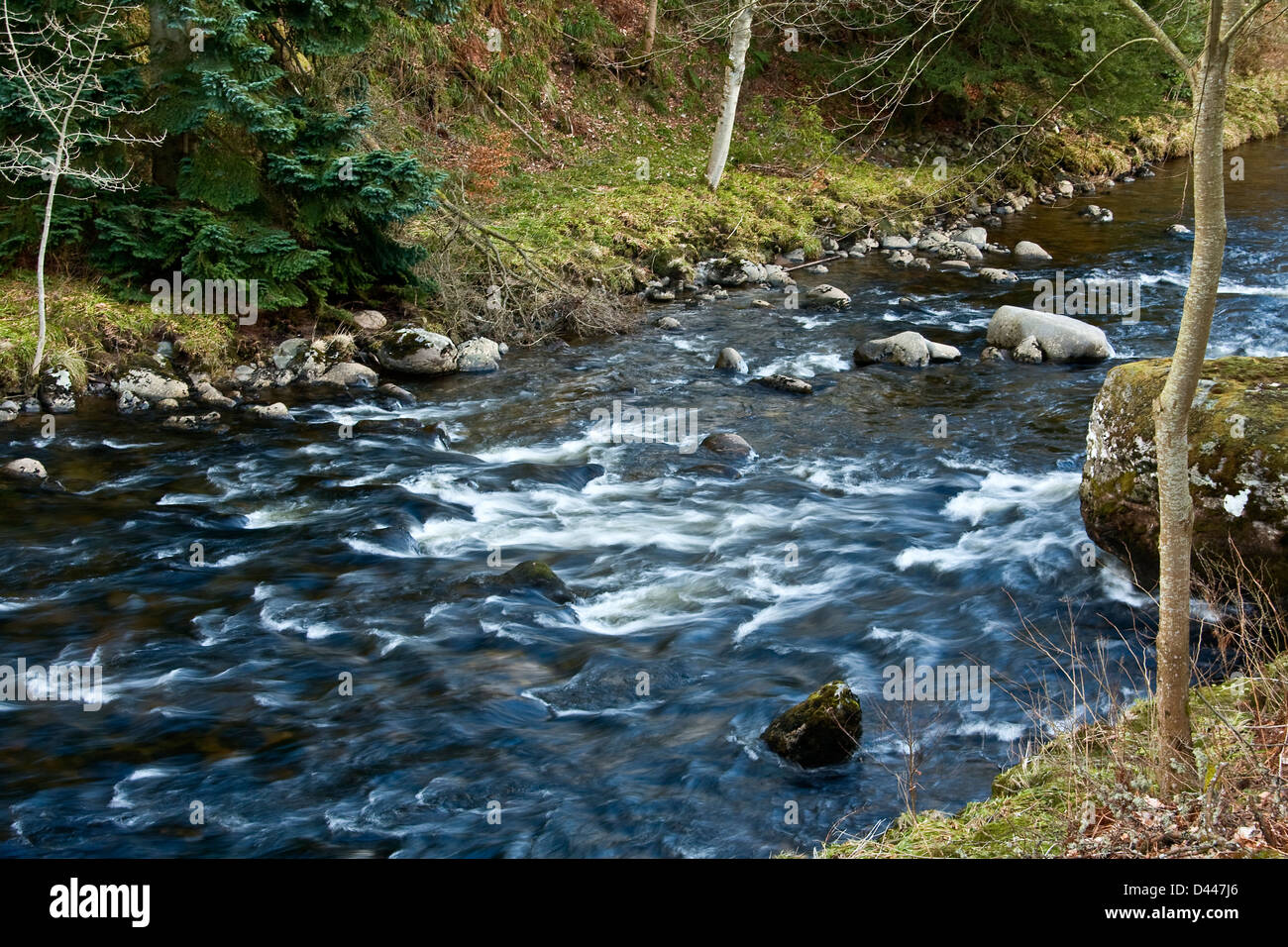 Small rapids and fast flowing waters of the River South Esk through the ... Small rapids and fast flowing waters of the River South Esk through the ...