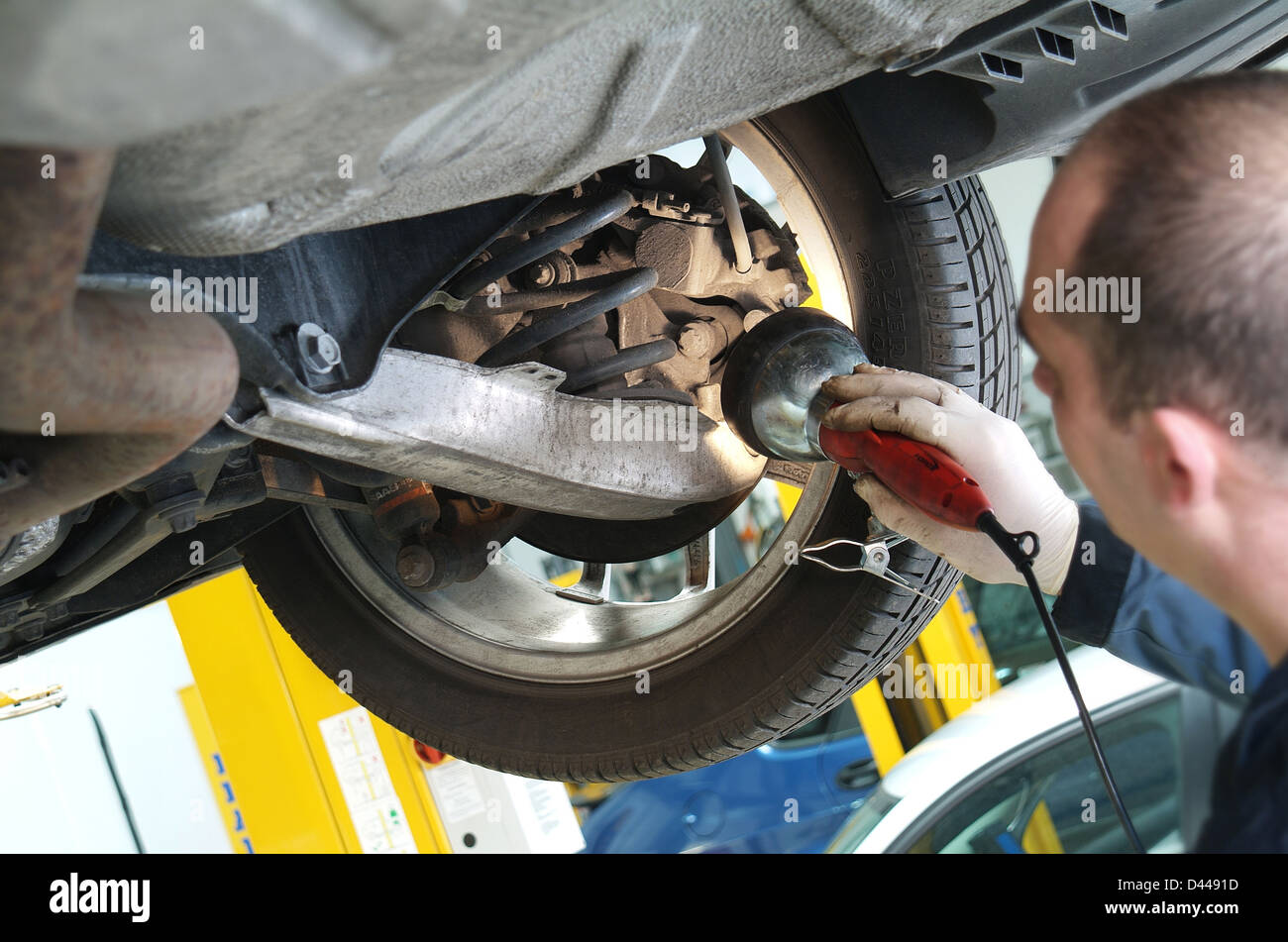 Checking underneath High Resolution Stock Photography and Images - Alamy