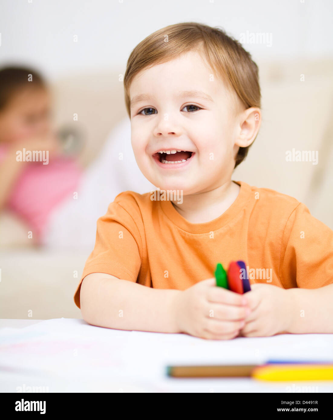Boy Using Crayons High Resolution Stock Photography and Images - Alamy