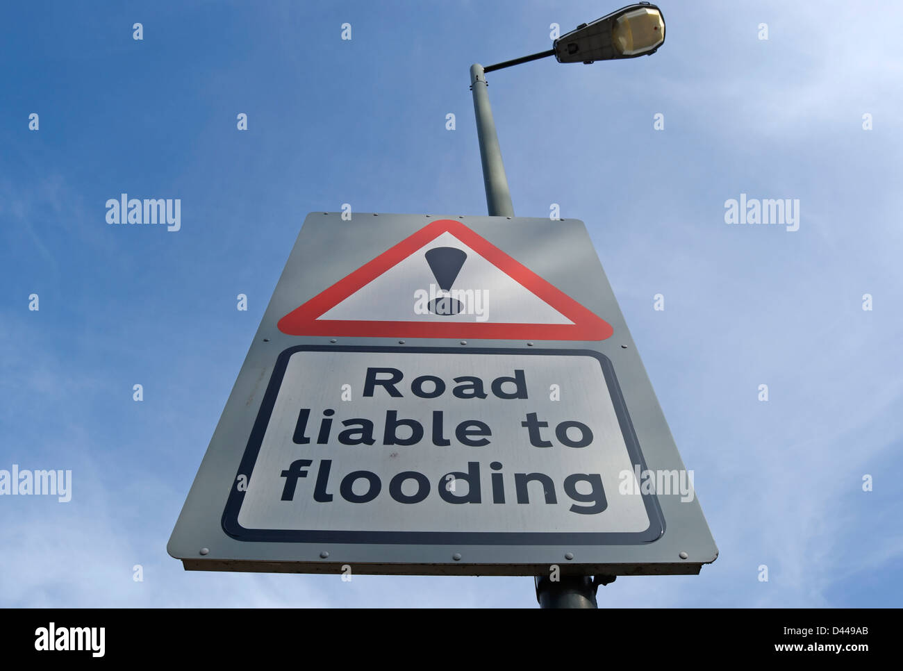 british road liable to flooding road sign with exclamation mark above ...