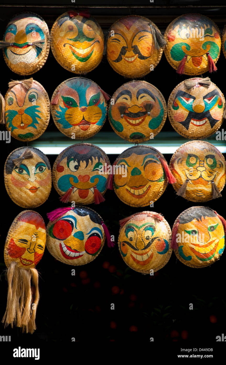 Vertical close up of traditional North Vietnamese bamboo masks on sale ...