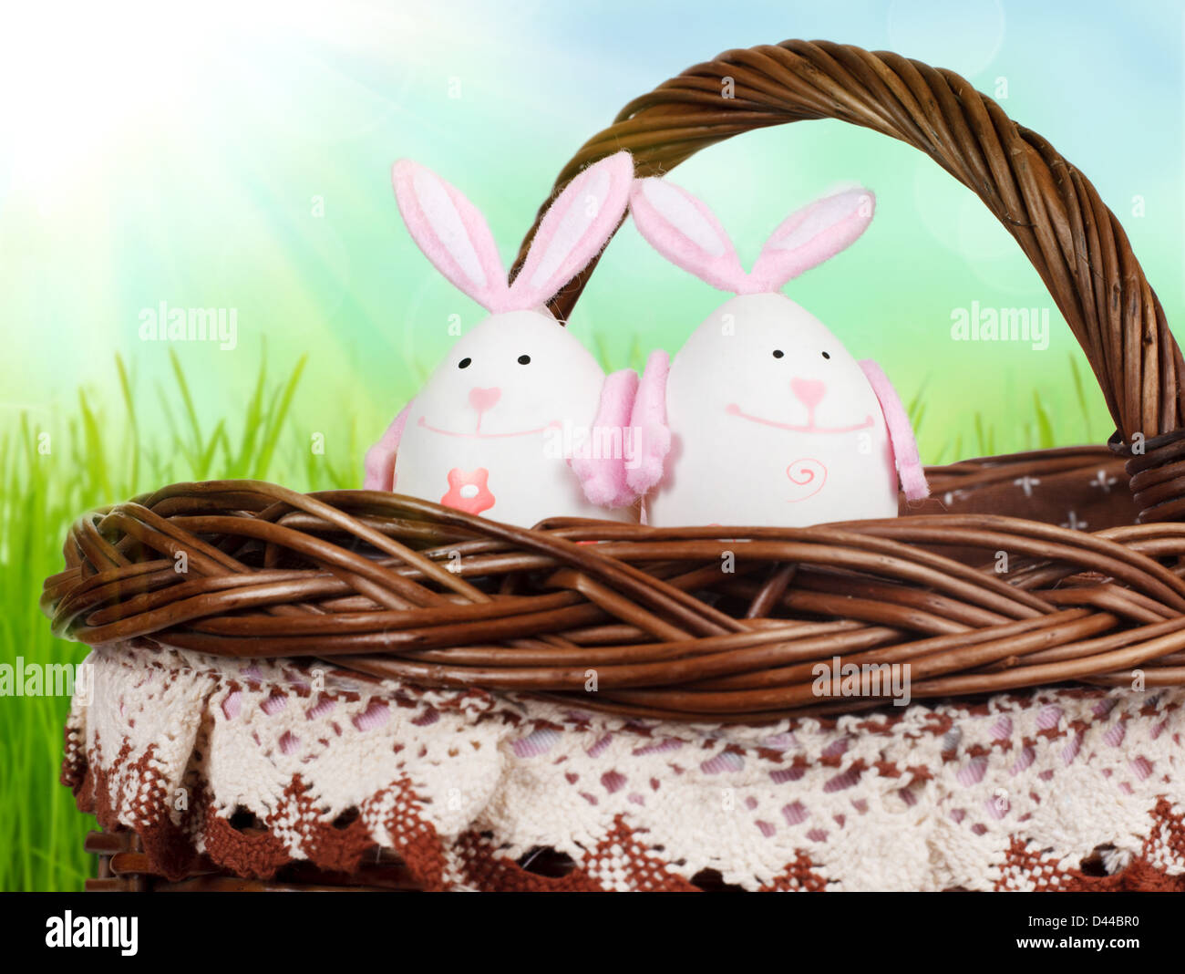 Easter egg in a basket Stock Photo - Alamy