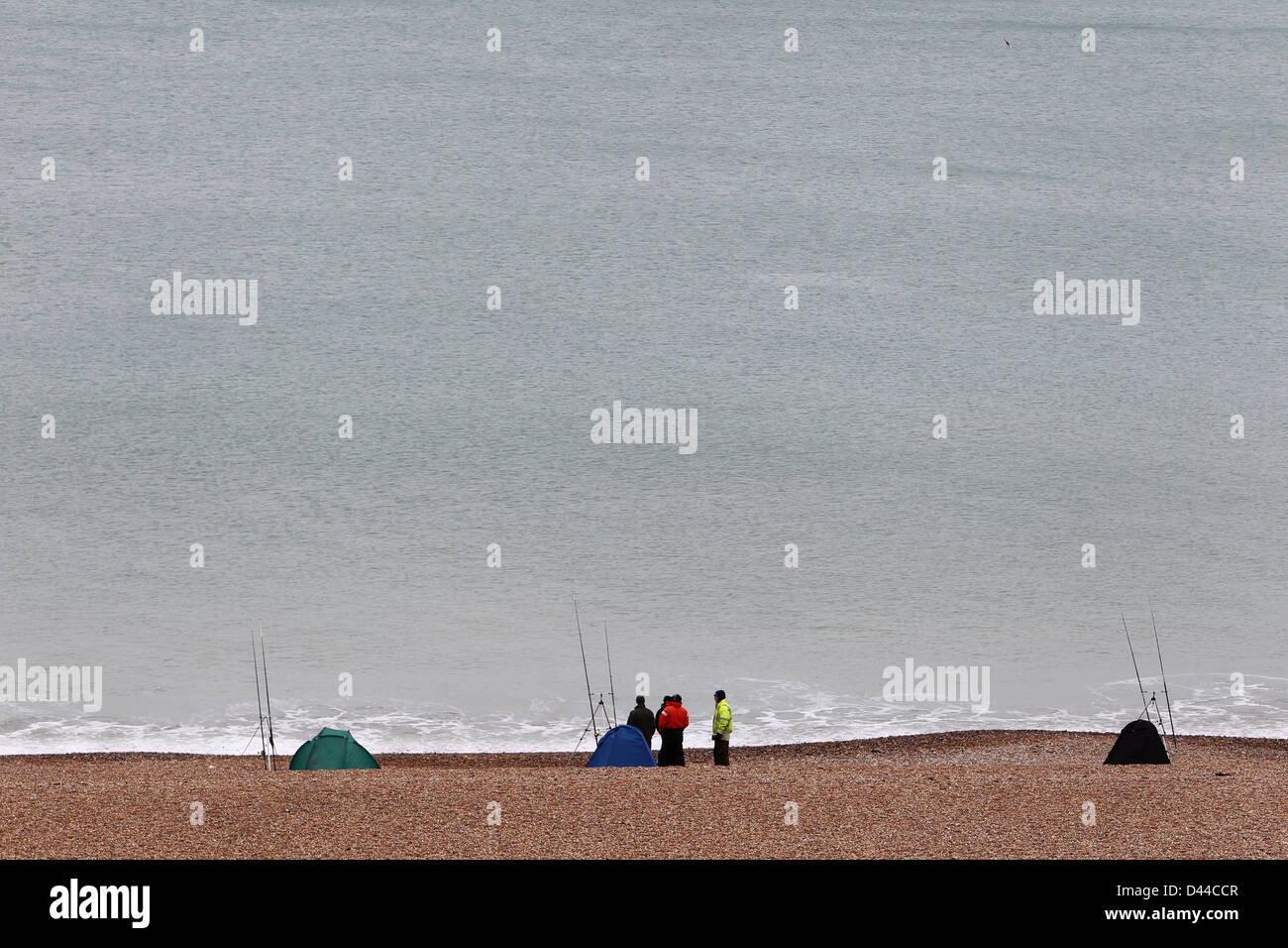Fishermen pictured fishing on Brighton seafront, Brighton, East Sussex ...