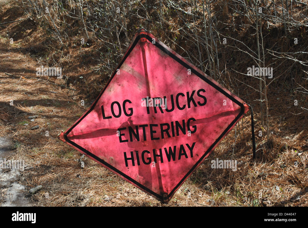 log trucks warning sign Stock Photo - Alamy