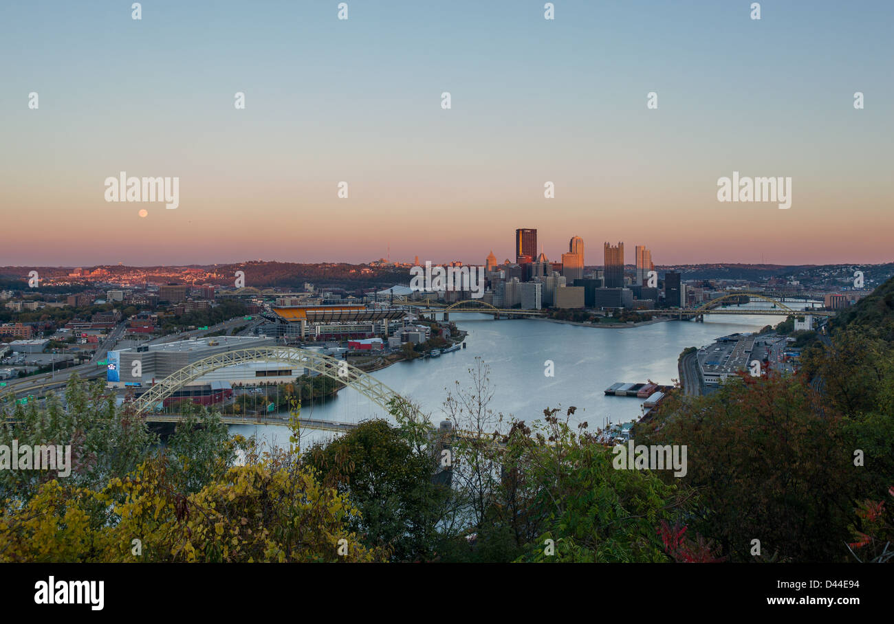 View of the city of Pittsburgh at sunset as the moon rises over the ...