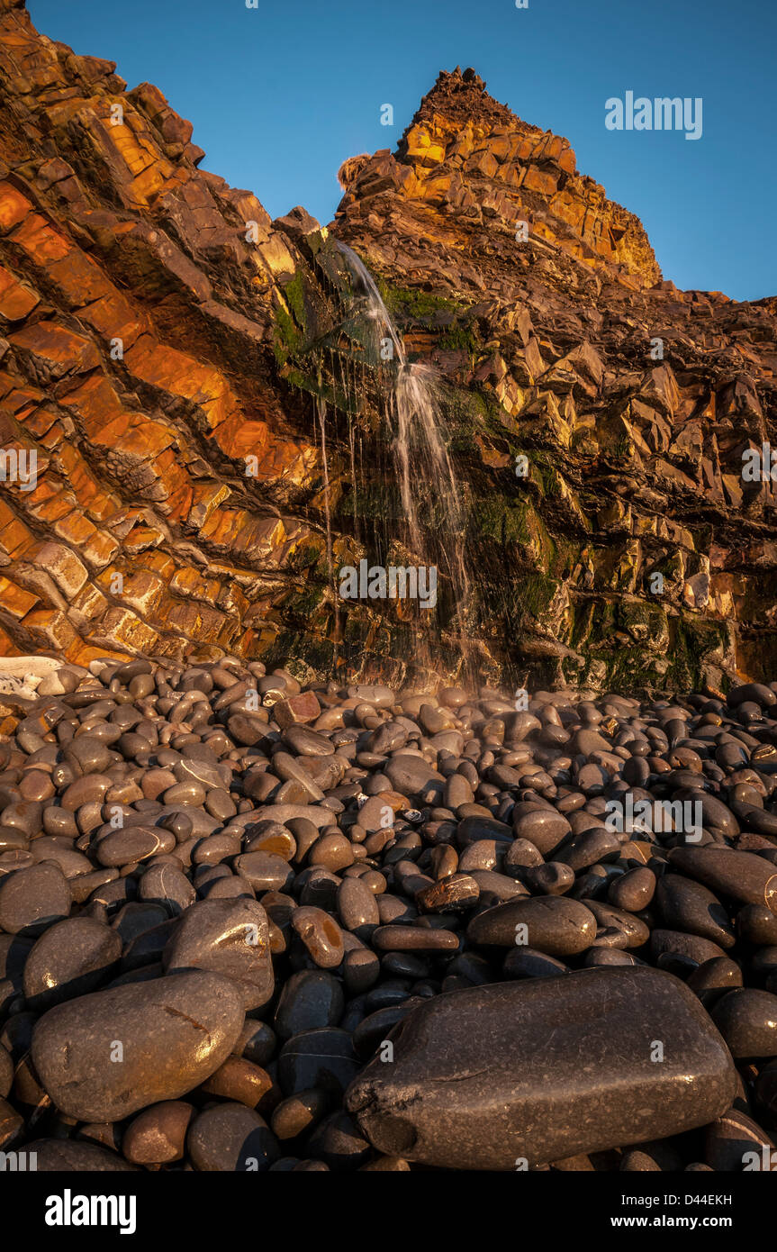 a small water fall at sandymouth bay,cornwall Stock Photo - Alamy
