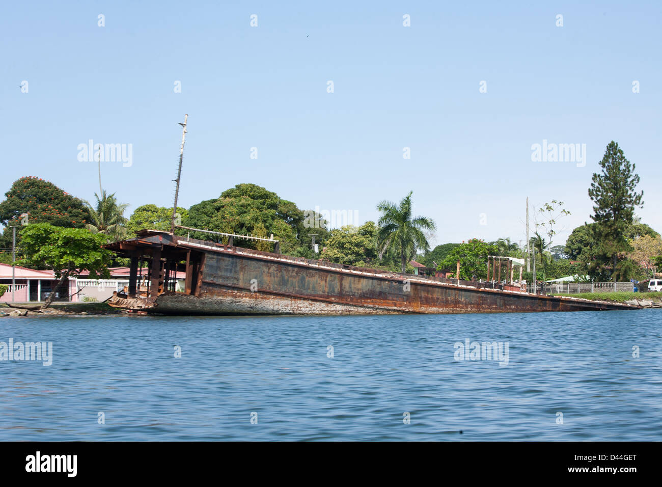 A sunken barge with the front end sticking out of the water Stock Photo ...
