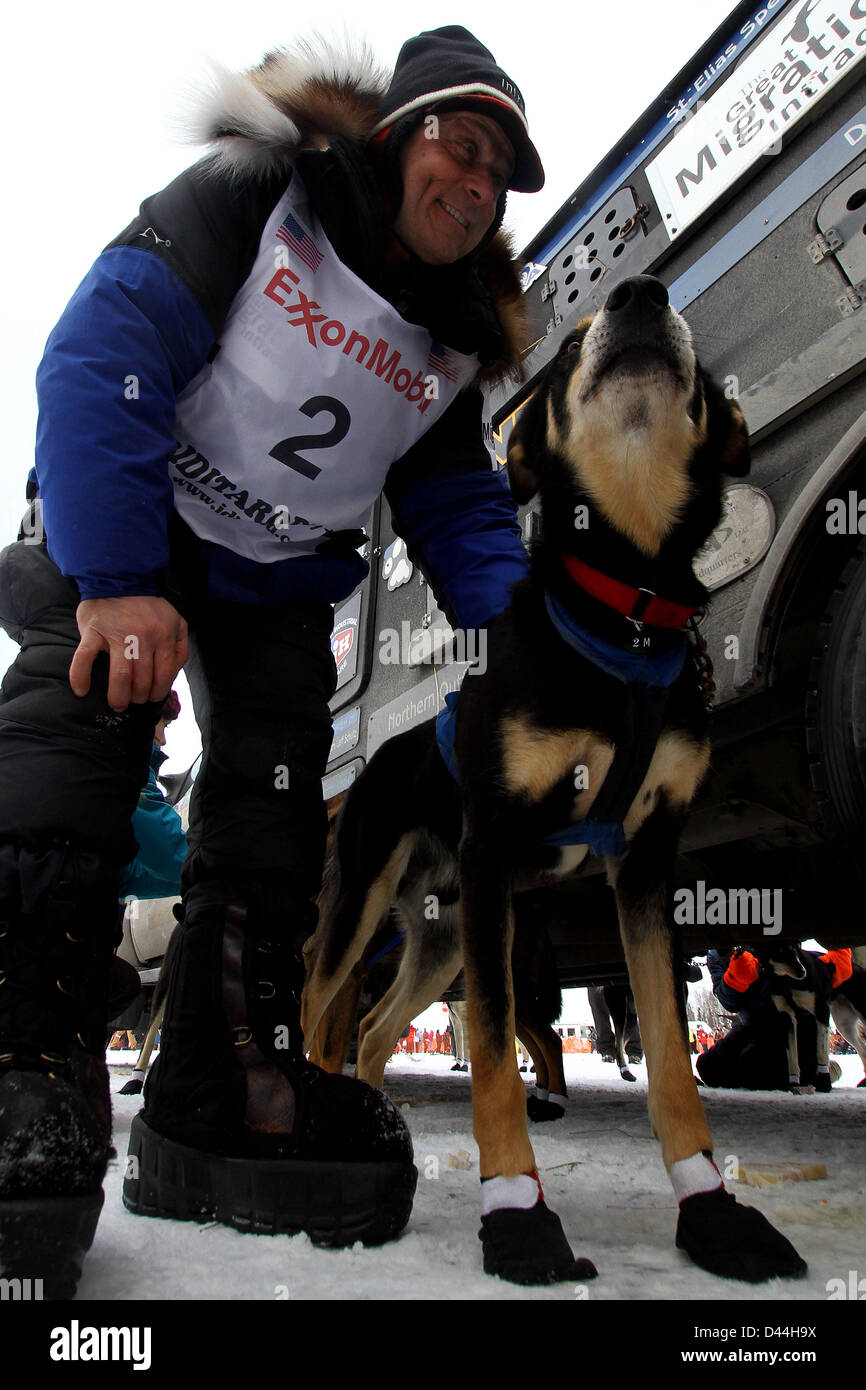 Mar 04, 2013 - Willow, Alaska, U.S. - MARTIN BUSER pets one of his sled ...