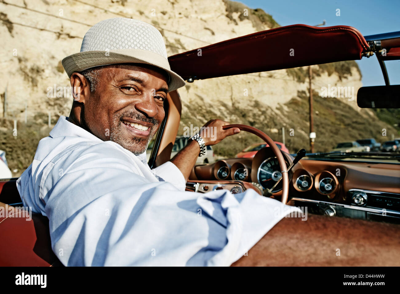 African american man driving convertible hi-res stock photography and ...