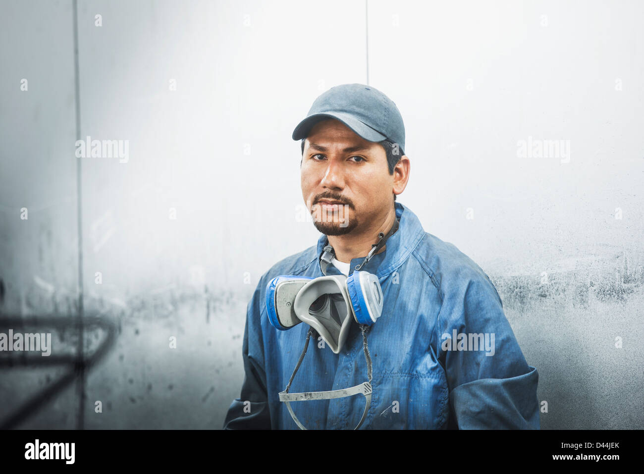 Worker standing in manufacturing plant Stock Photo - Alamy