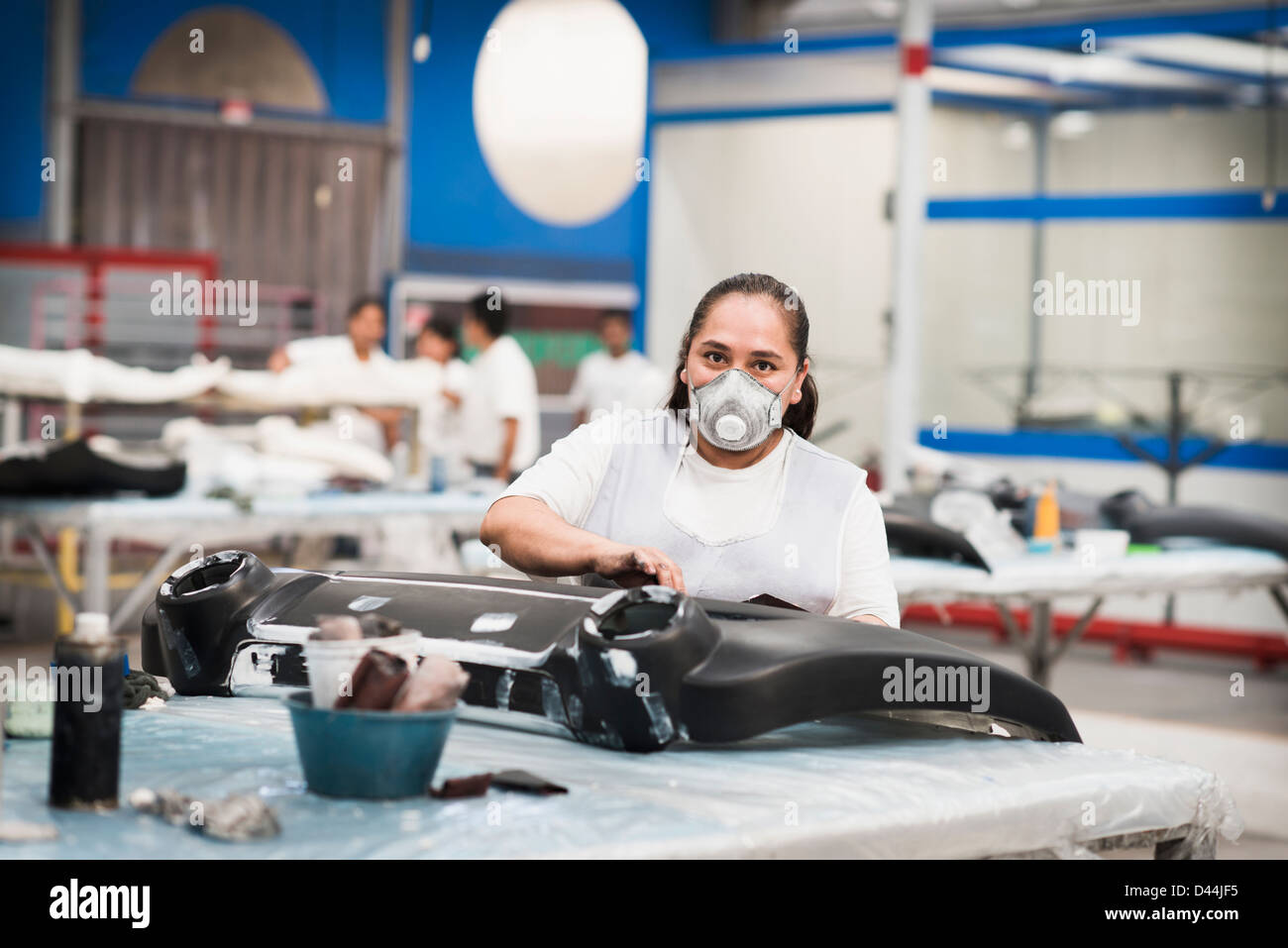 Worker wearing face mask in manufacturing plant Stock Photo - Alamy