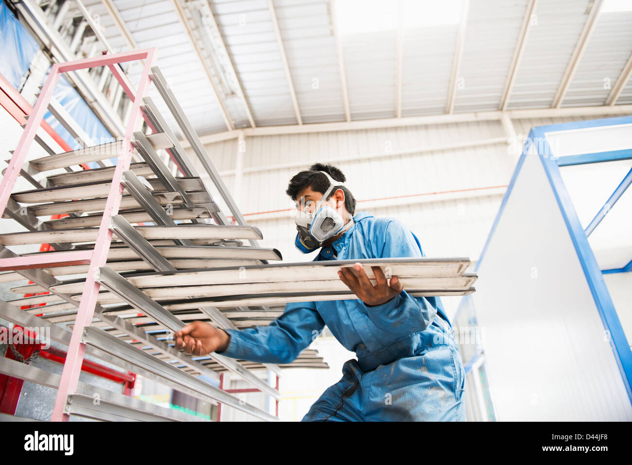 Man working in manufacturing plant Stock Photo - Alamy