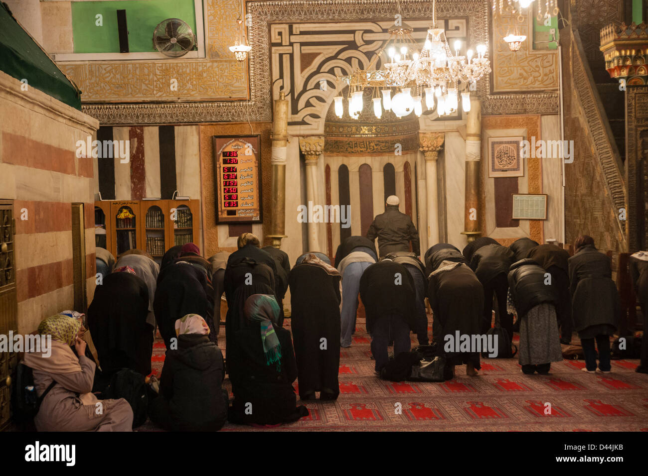 Hebron, Israel. A group of religious Muslims bow towards Mecca while ...