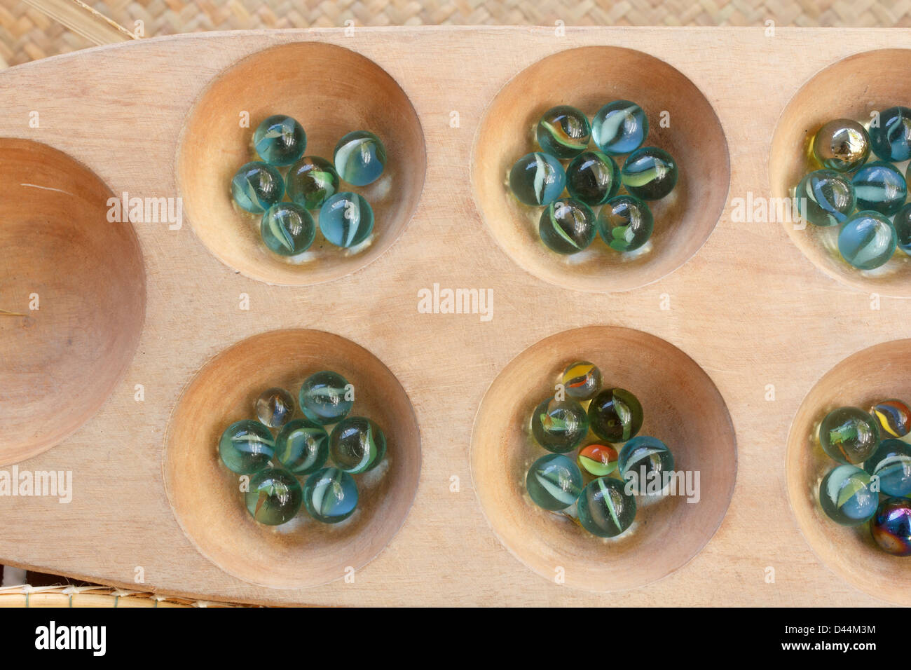 Mancala (or Wari) a classic board game in Thailand Stock Photo - Alamy
