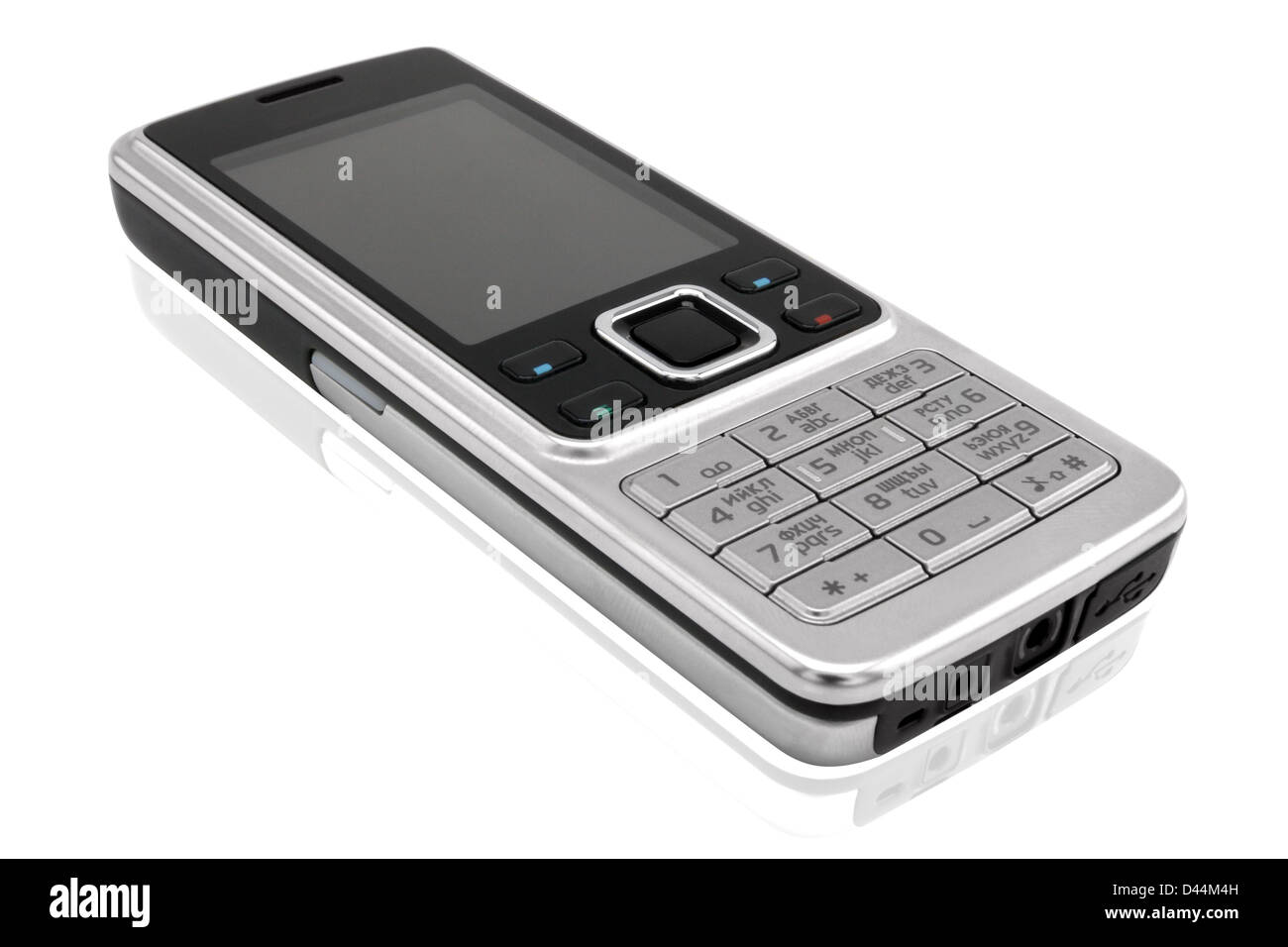 Modern silver mobile phone with reflection isolated on a white ...
