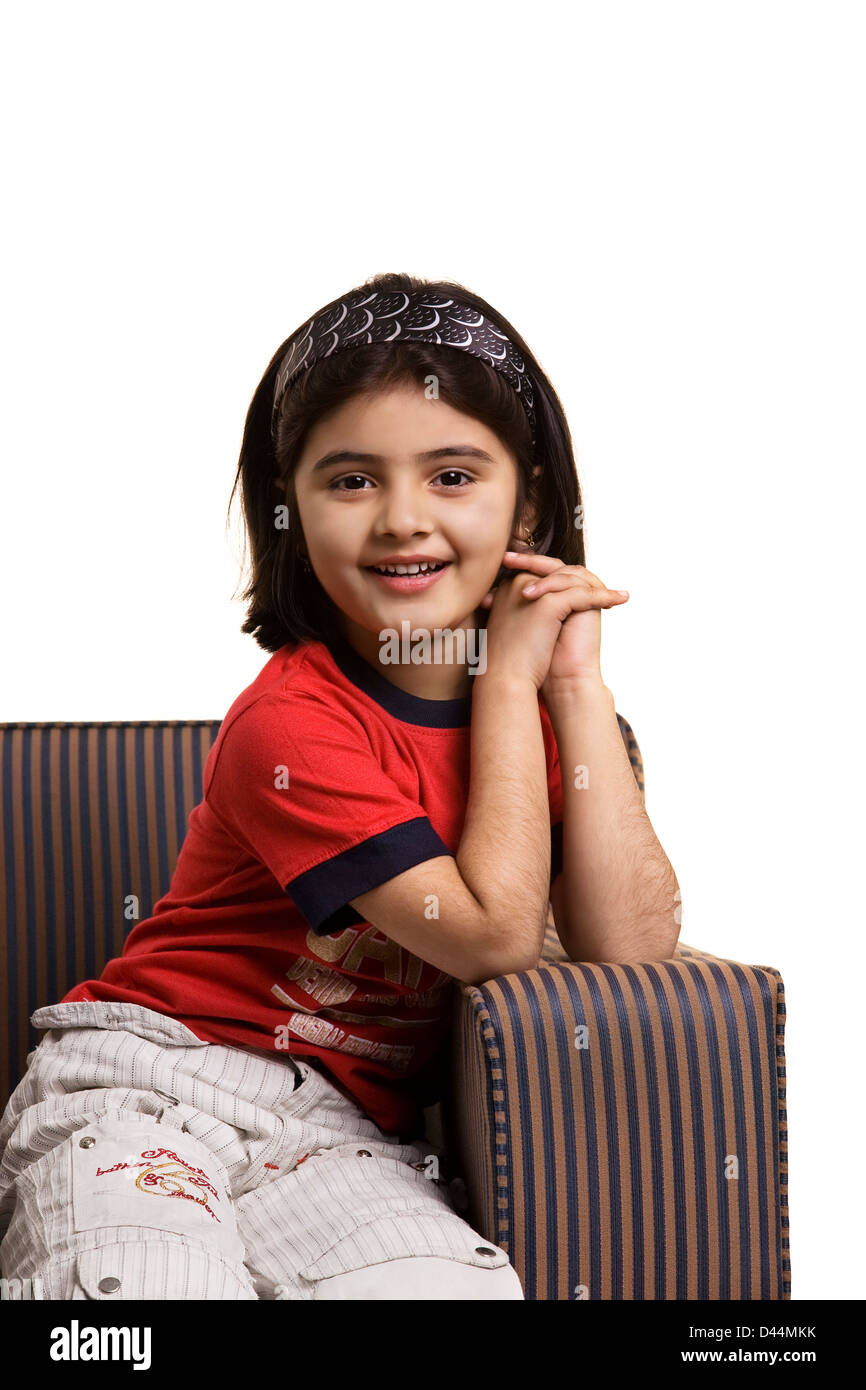 Portrait of a girl on a sofa Stock Photo - Alamy