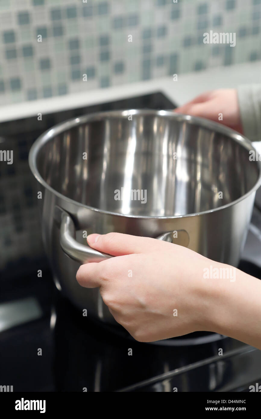 Woman prepare for dinner Stock Photo - Alamy