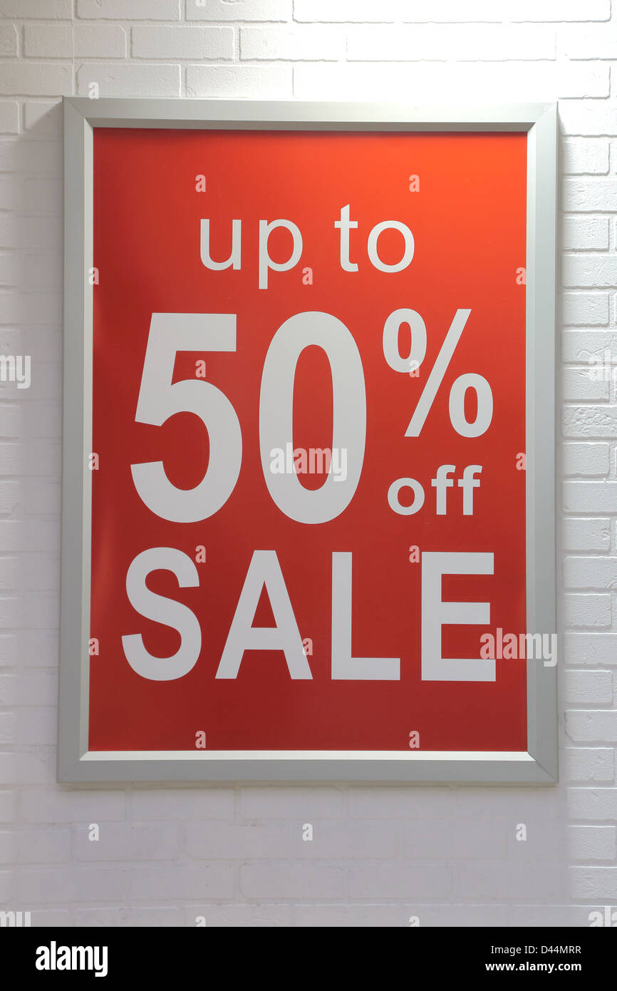 Sale sign on wall Stock Photo - Alamy