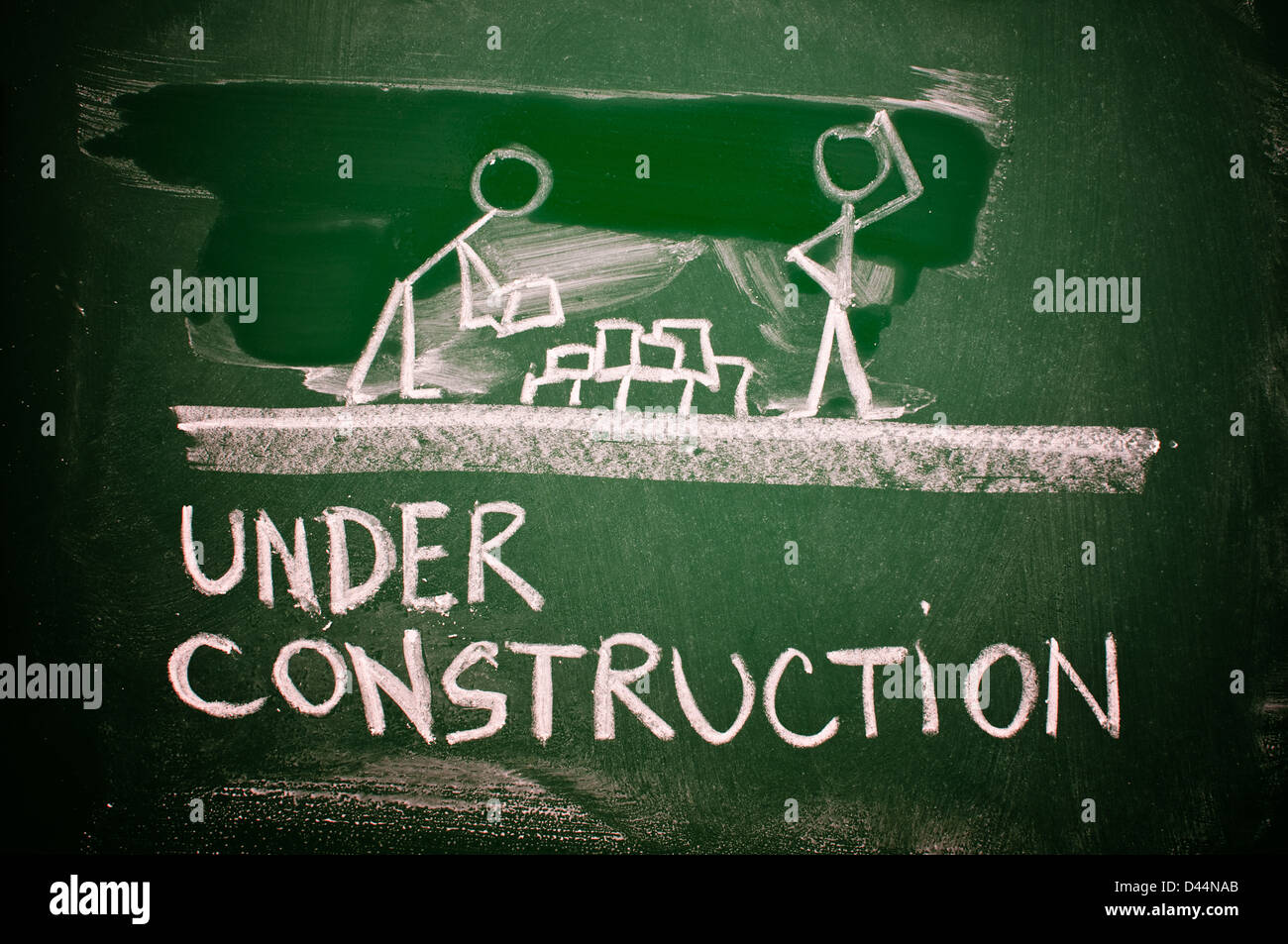 Under construction, simple hand drawn illustration of two human figures ...