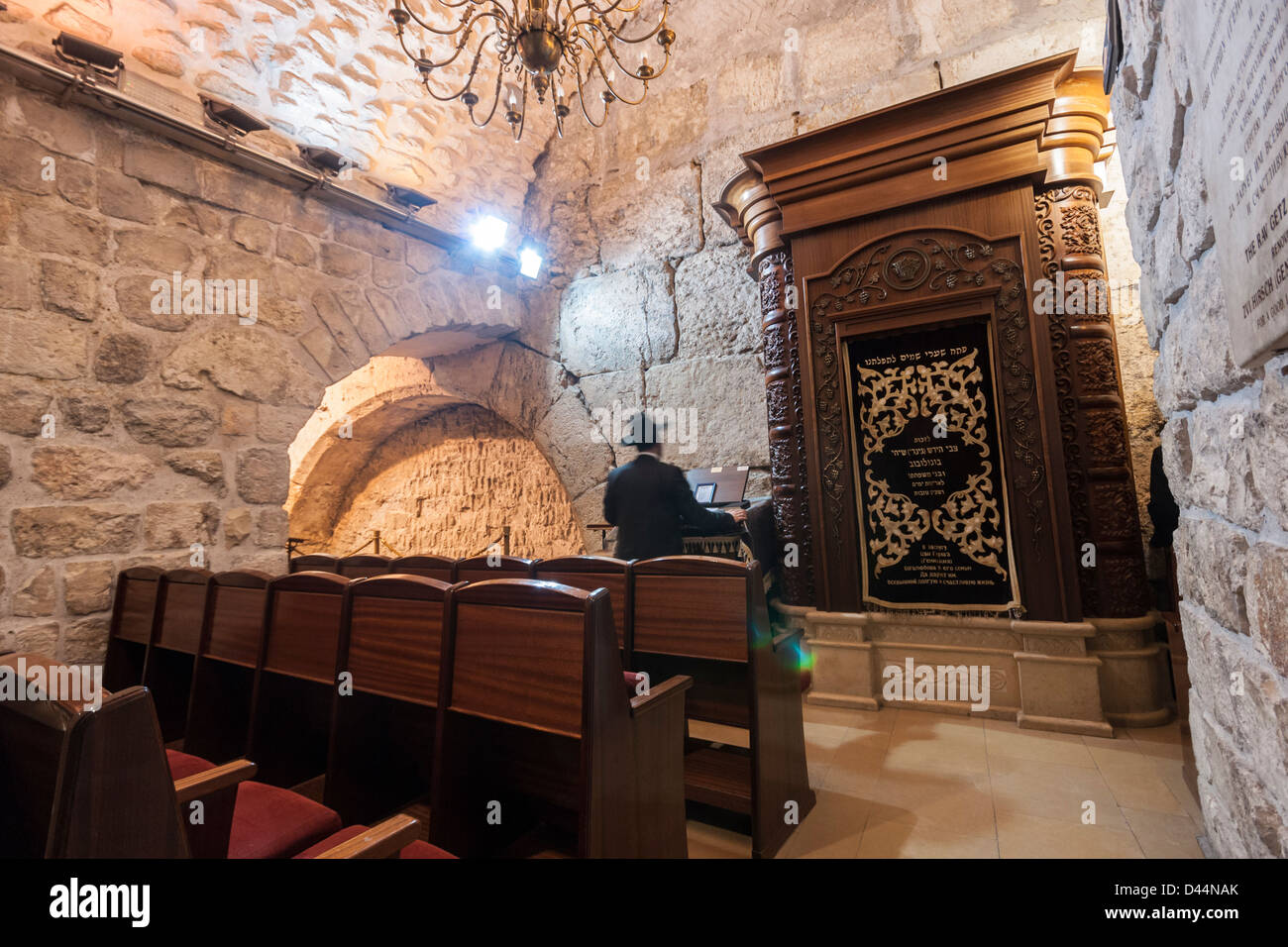 Jerusalem, Israel. Man prays in an underground Synagogue located in the ...