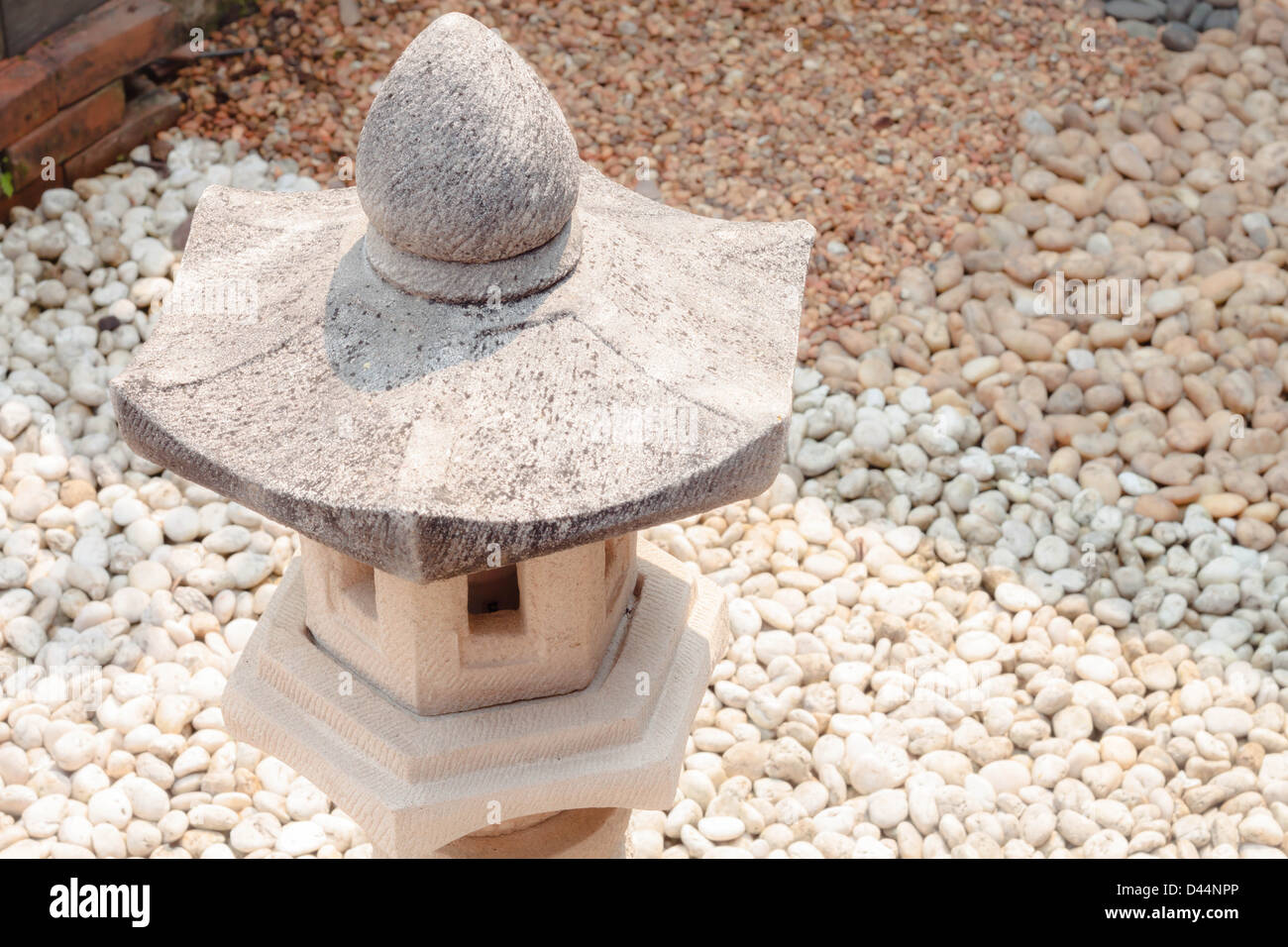 Mini pavilion rock lamp in home garden Stock Photo - Alamy