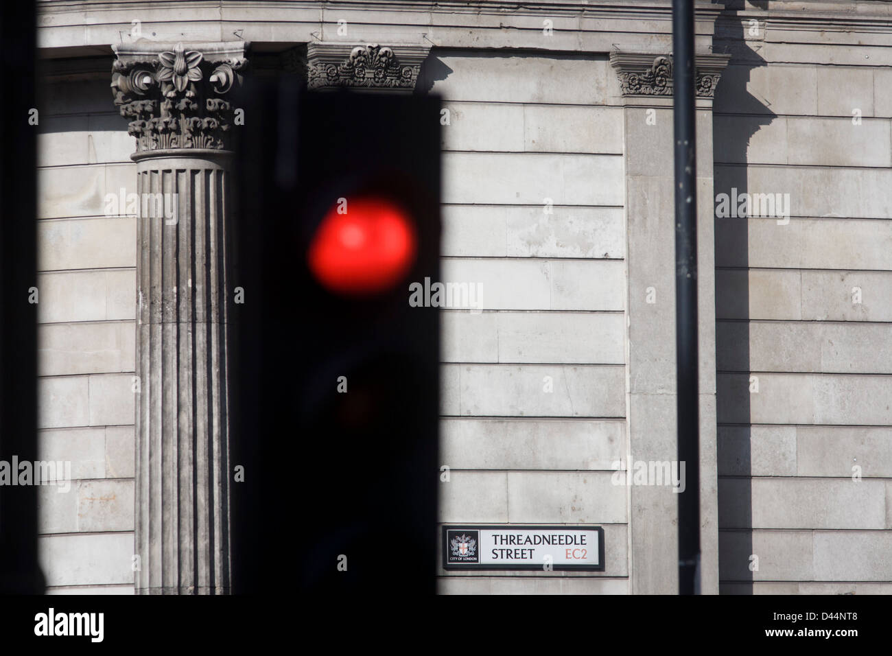 Red Stop traffic light and pillars with City of London sign for ...