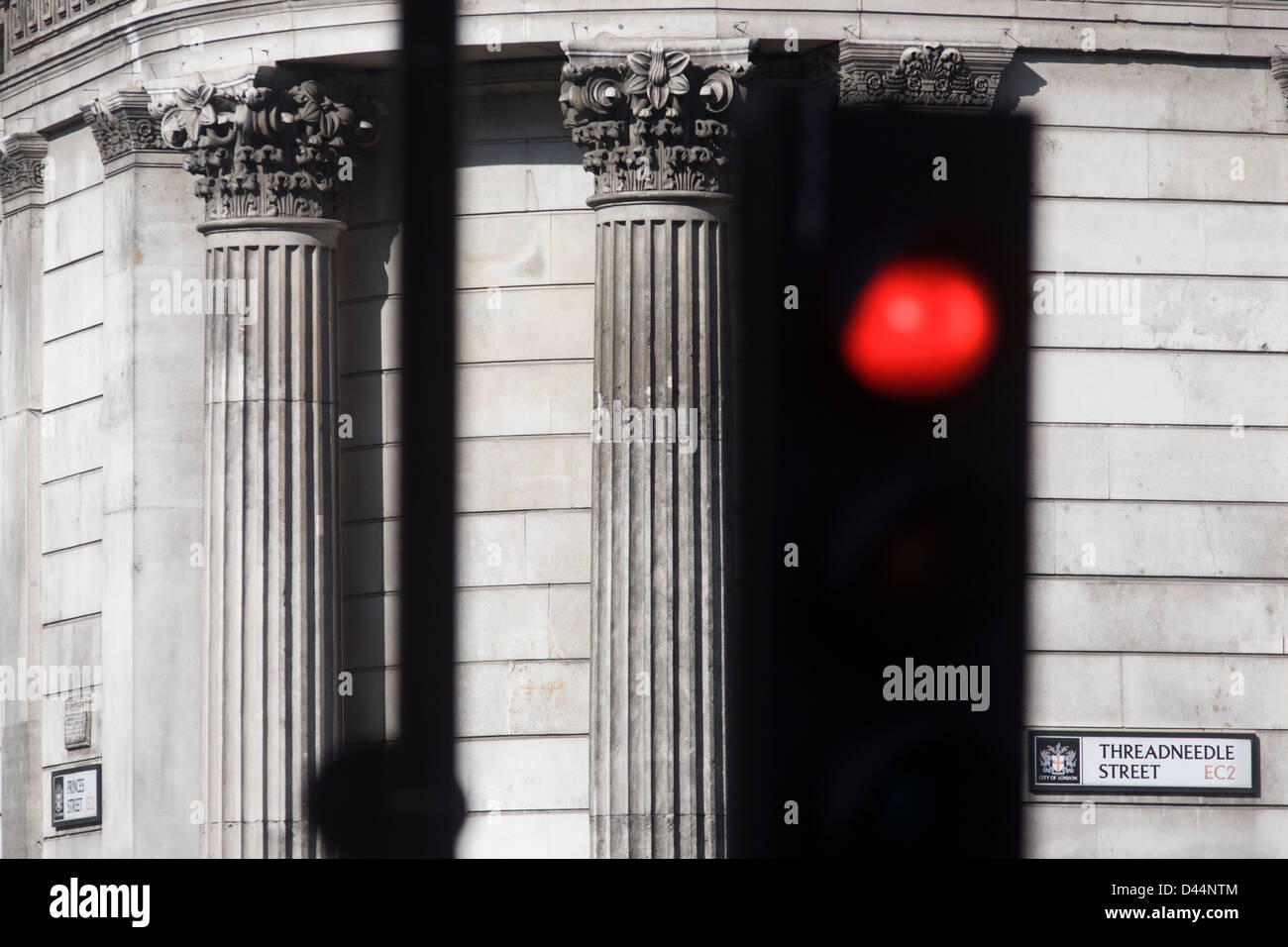 Red Stop traffic light and pillars with City of London sign for ...