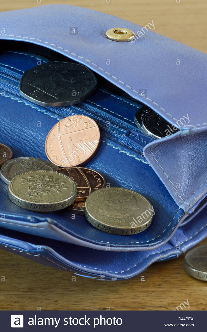 Money Falling Out Of Purse Stock Photos & Money Falling Out Of Purse ...