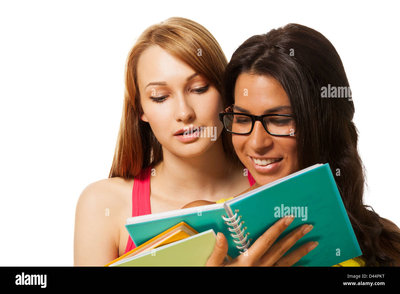 two beautiful girls reading book Stock Photo - Alamy