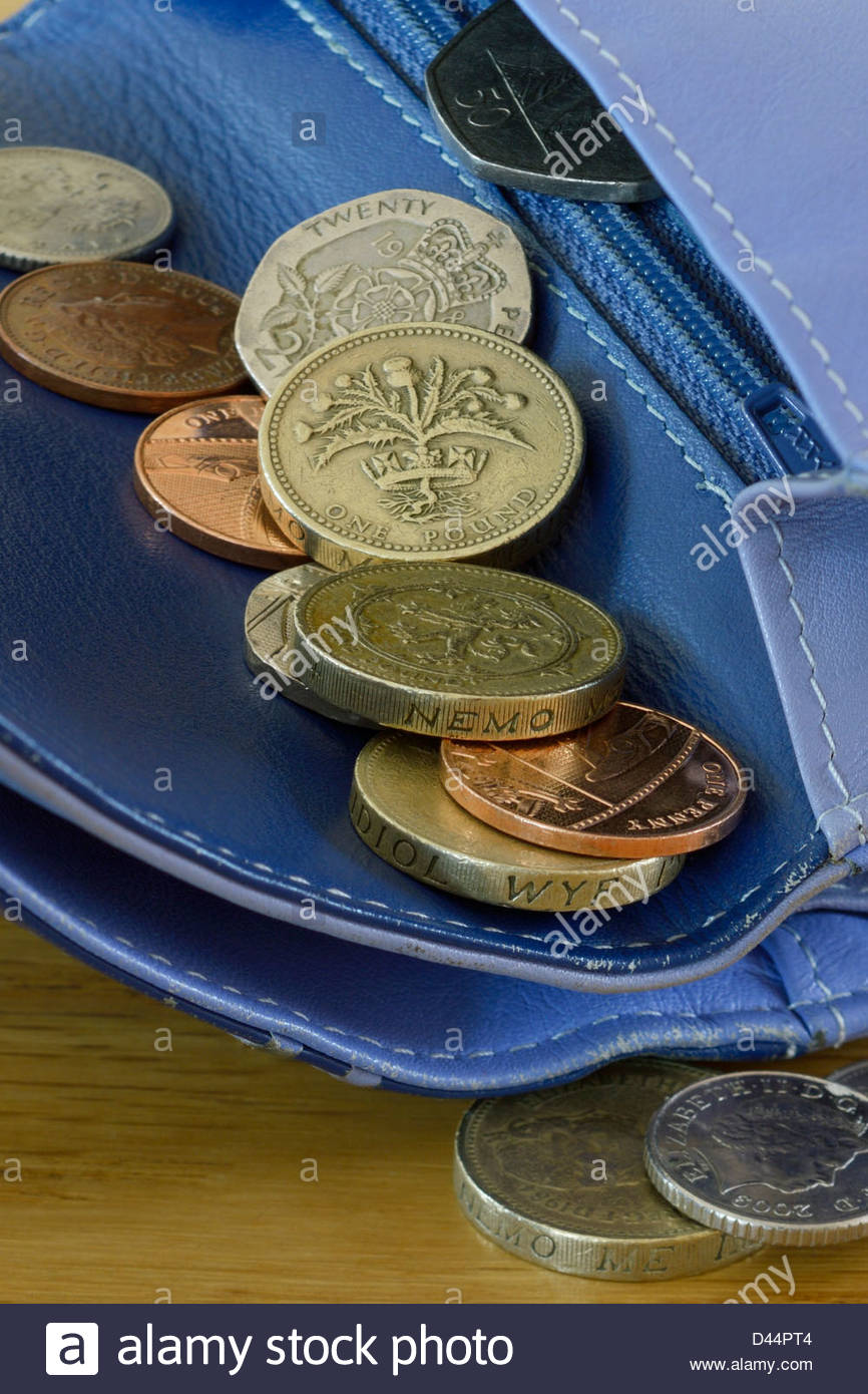 Money Falling Out Of Purse Stock Photos & Money Falling Out Of Purse ...