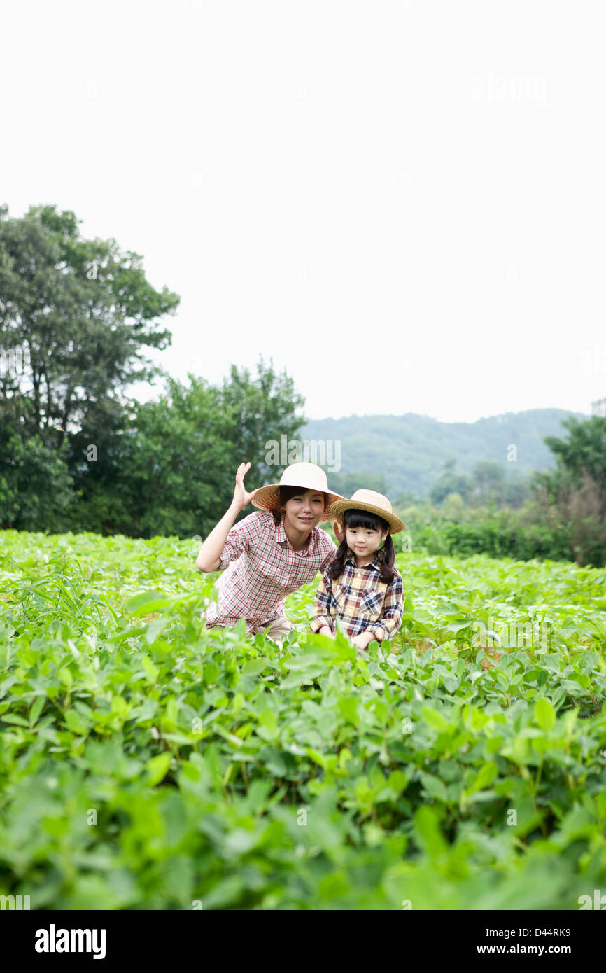 mother and daughter in a farm Stock Photo - Alamy