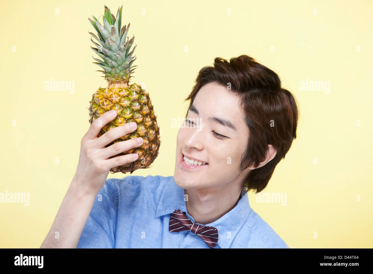 Cut pineapple face hi-res stock photography and images - Alamy
