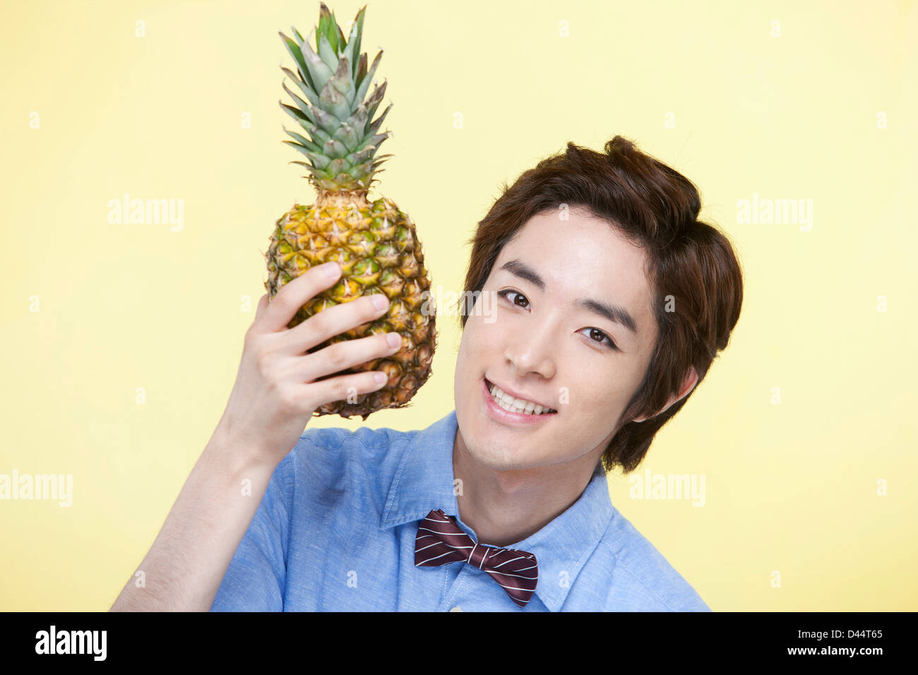 Cut pineapple face hi-res stock photography and images - Alamy