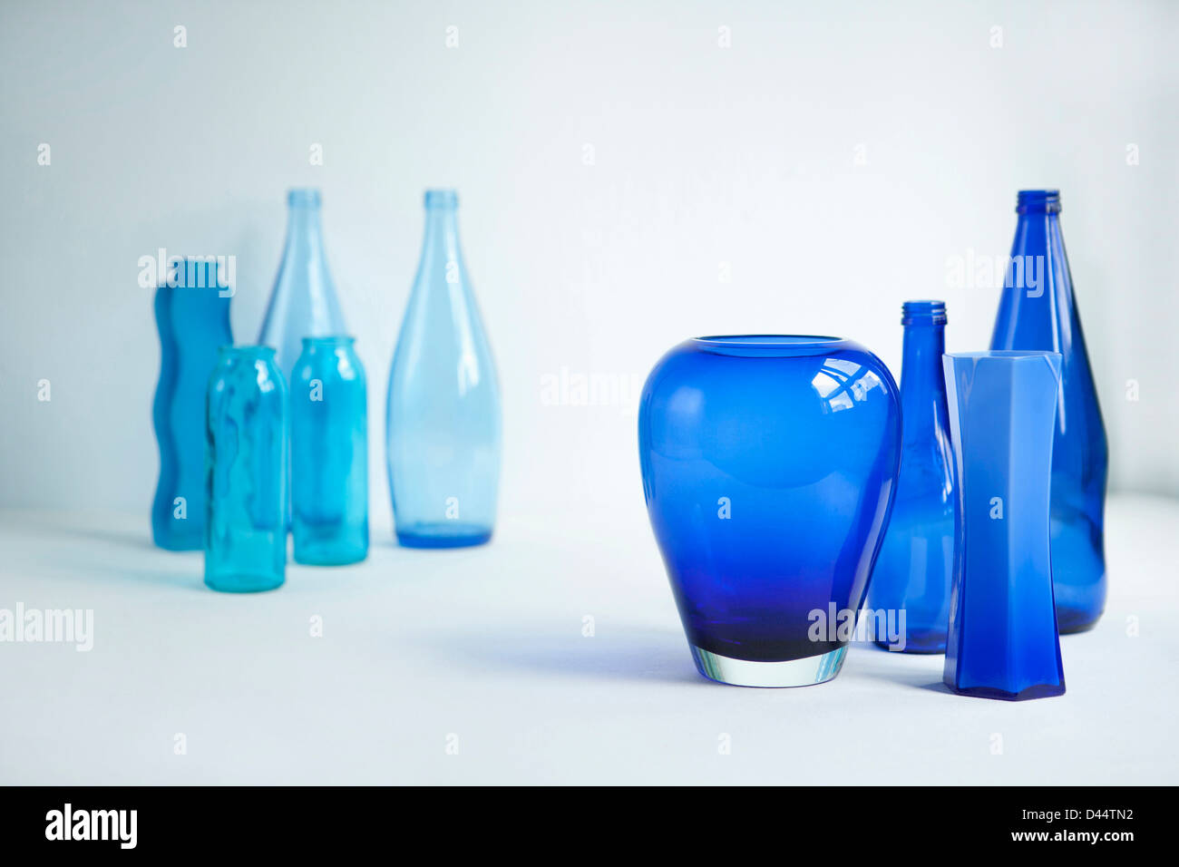 blue transparent vases and bottles Stock Photo - Alamy