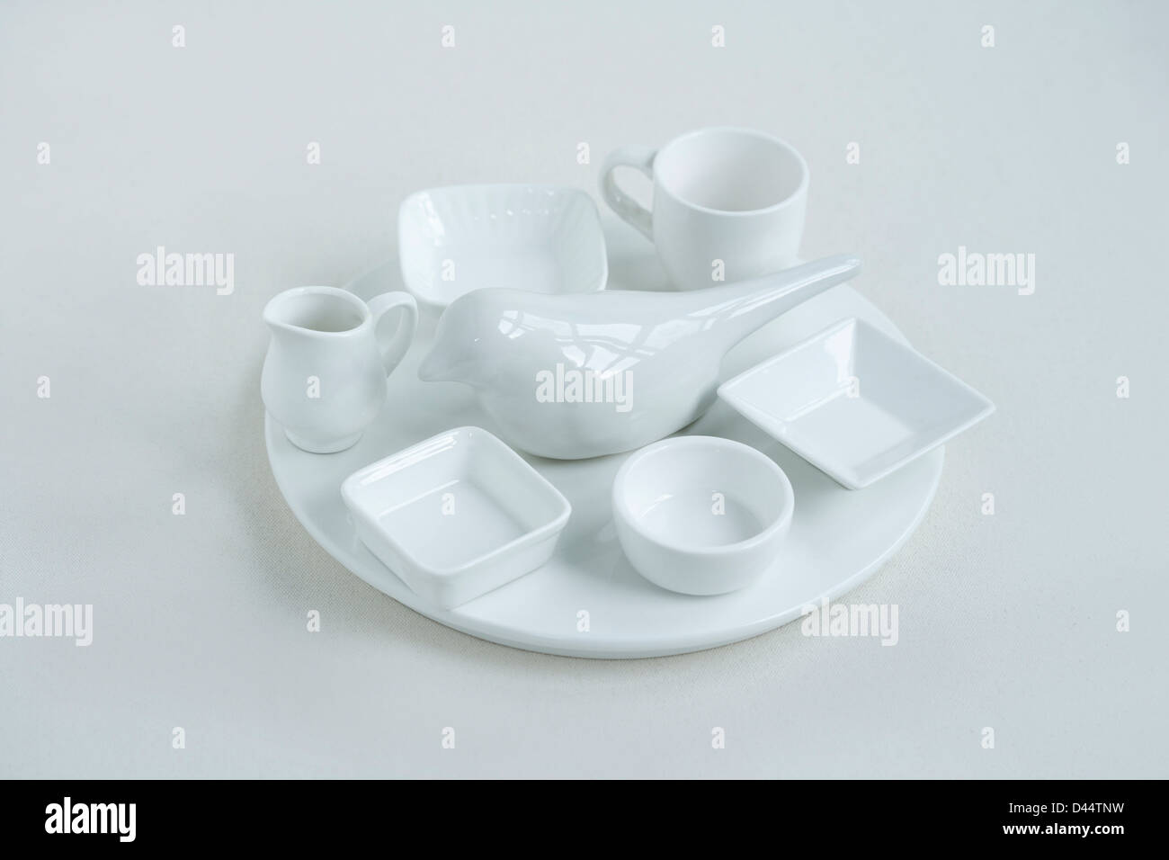 white plates, cups and jars Stock Photo - Alamy