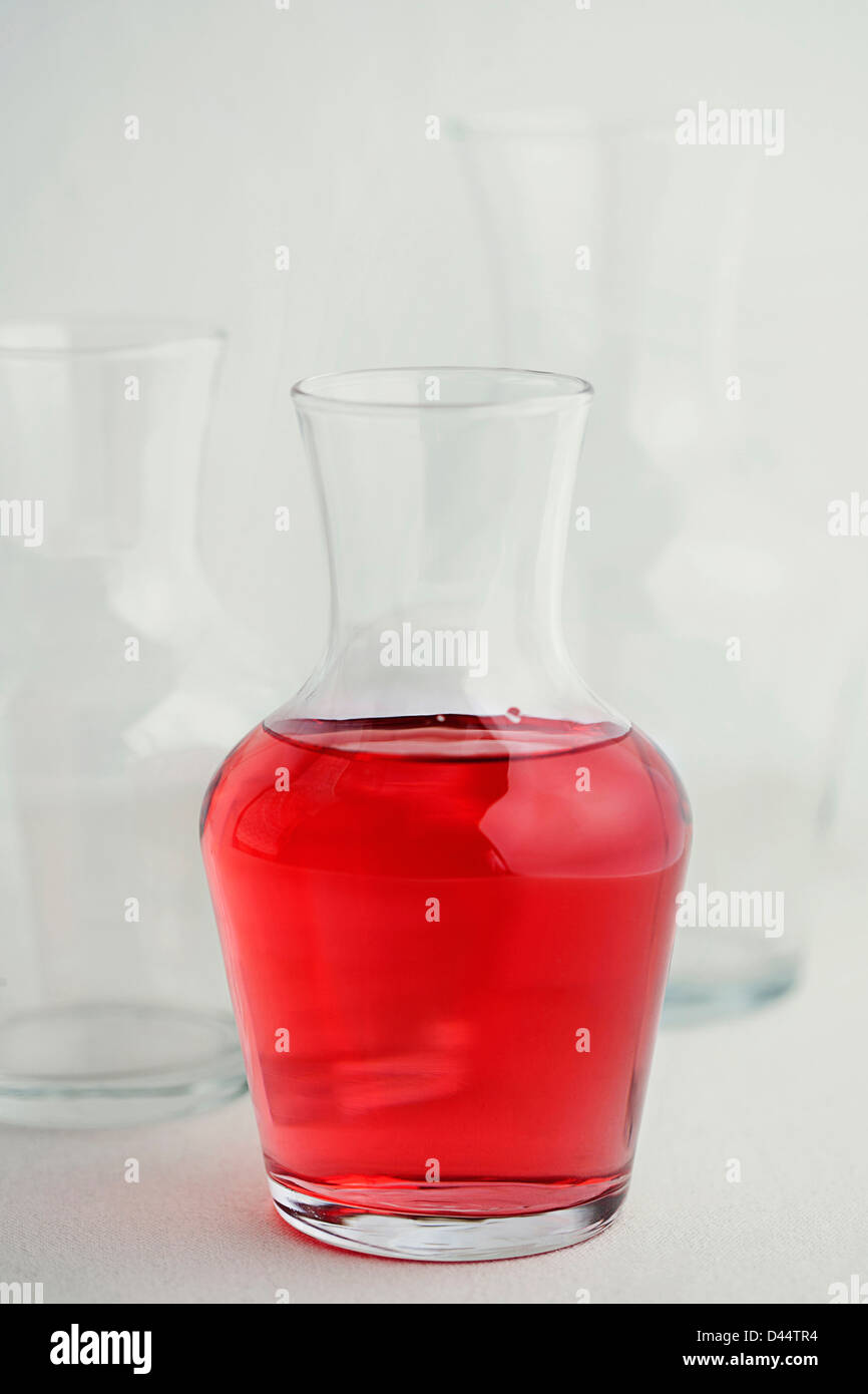 red liquid in a jar Stock Photo - Alamy