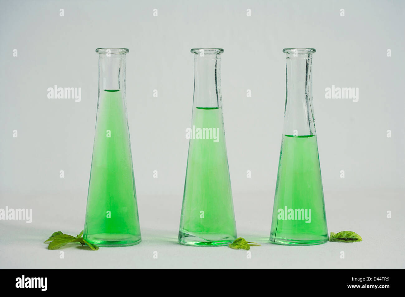 blue liquids in a transparent bottles Stock Photo - Alamy