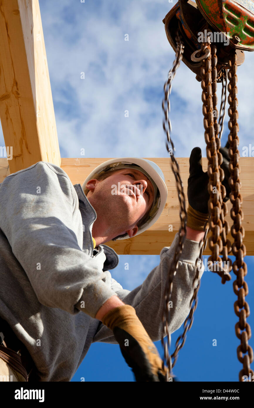 construction worker at work with winch Stock Photo - Alamy