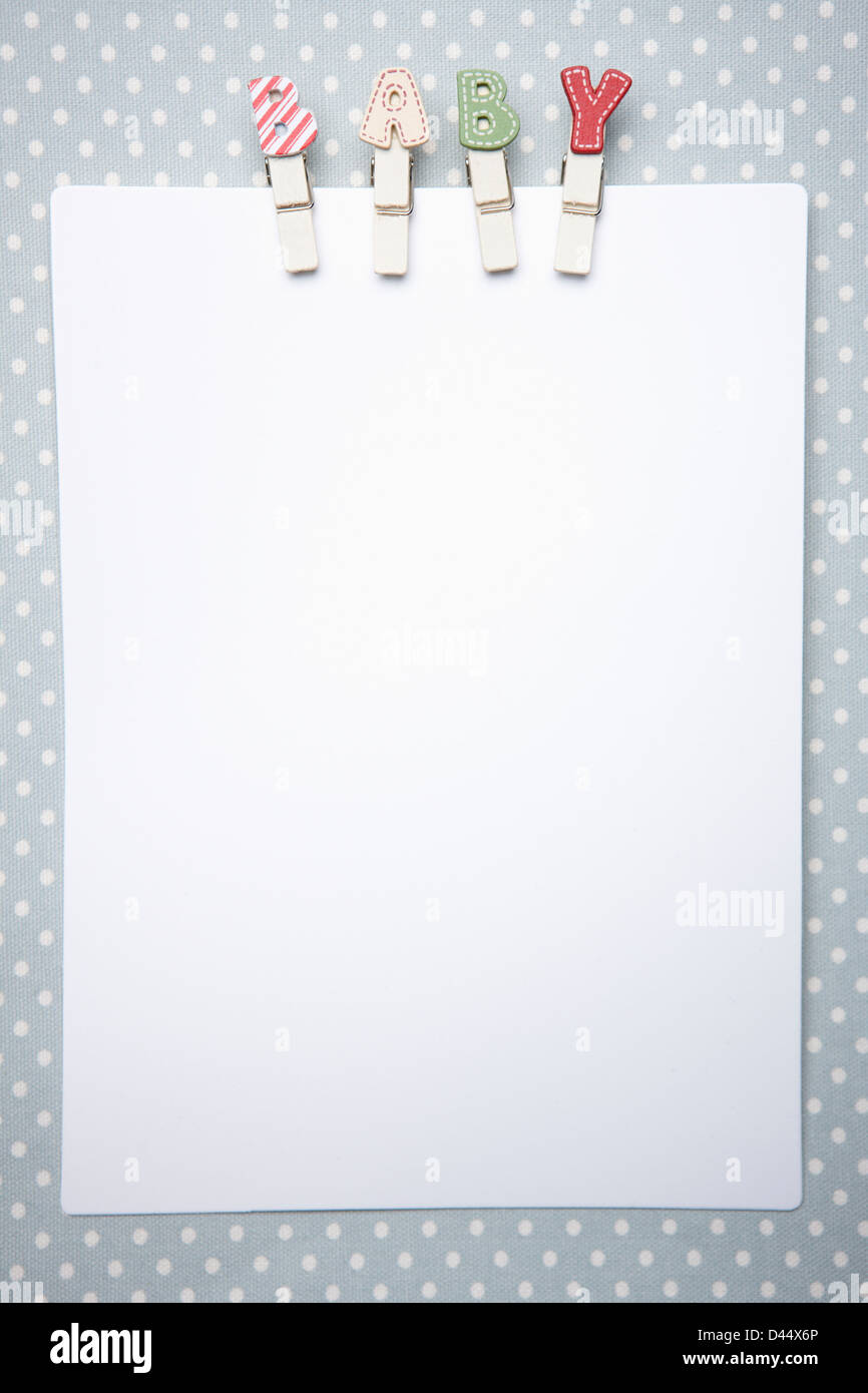 each paper clips forming a word baby Stock Photo - Alamy