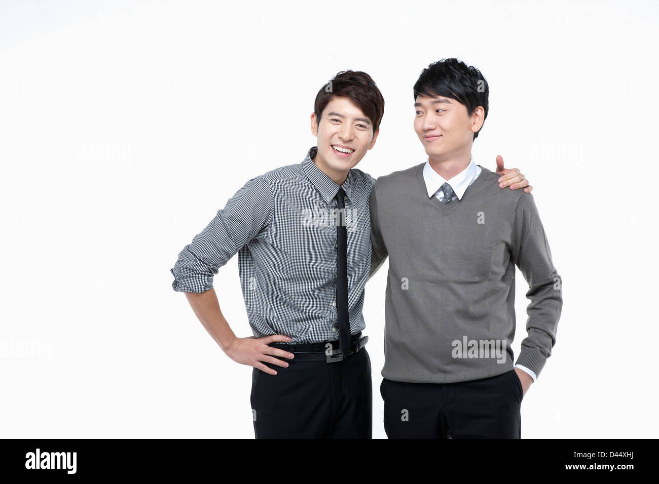 Businessmen arms around shoulder hi-res stock photography and images ...