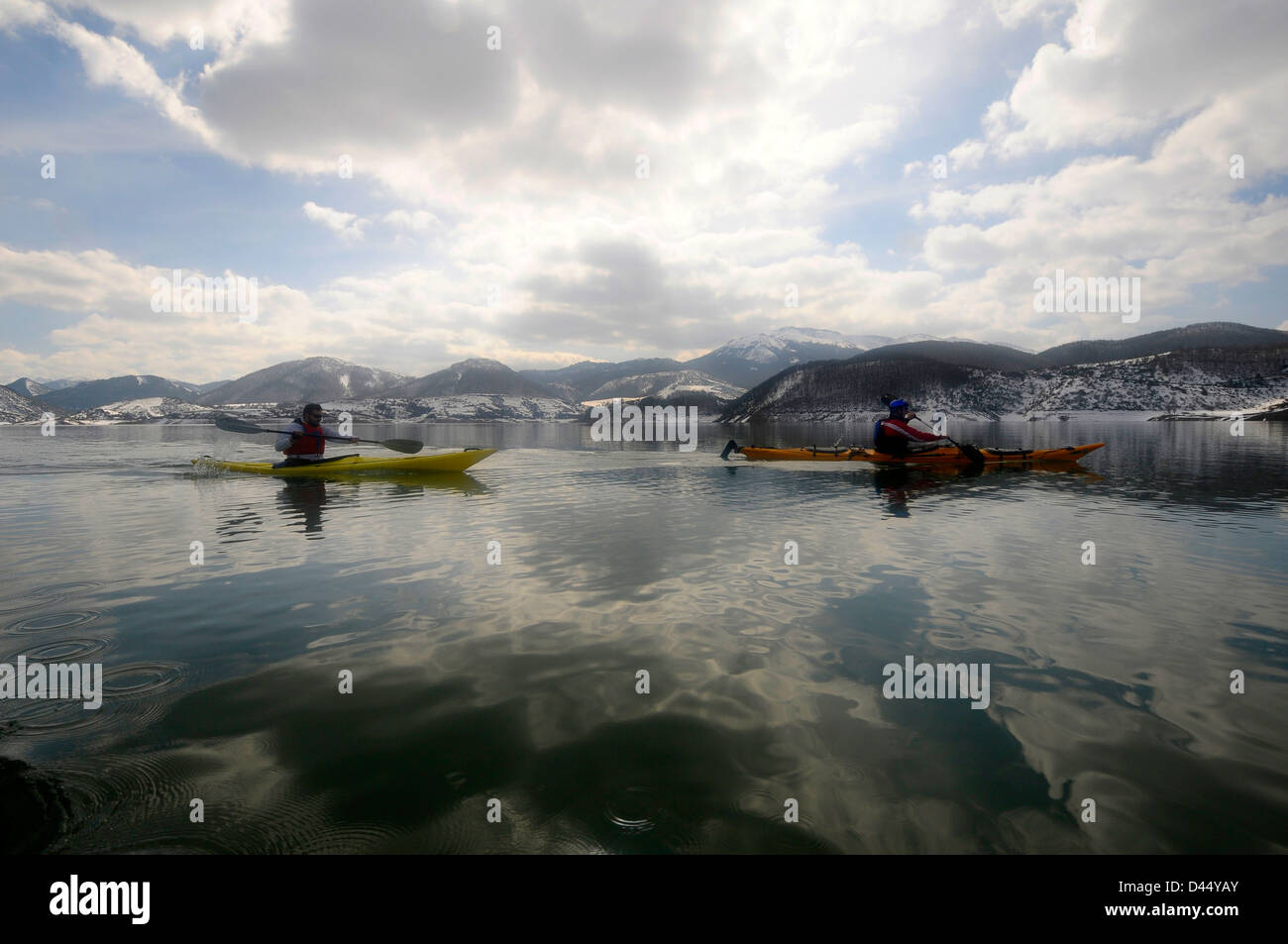 Winter canoe paddling on icy waters Stock Photo - Alamy