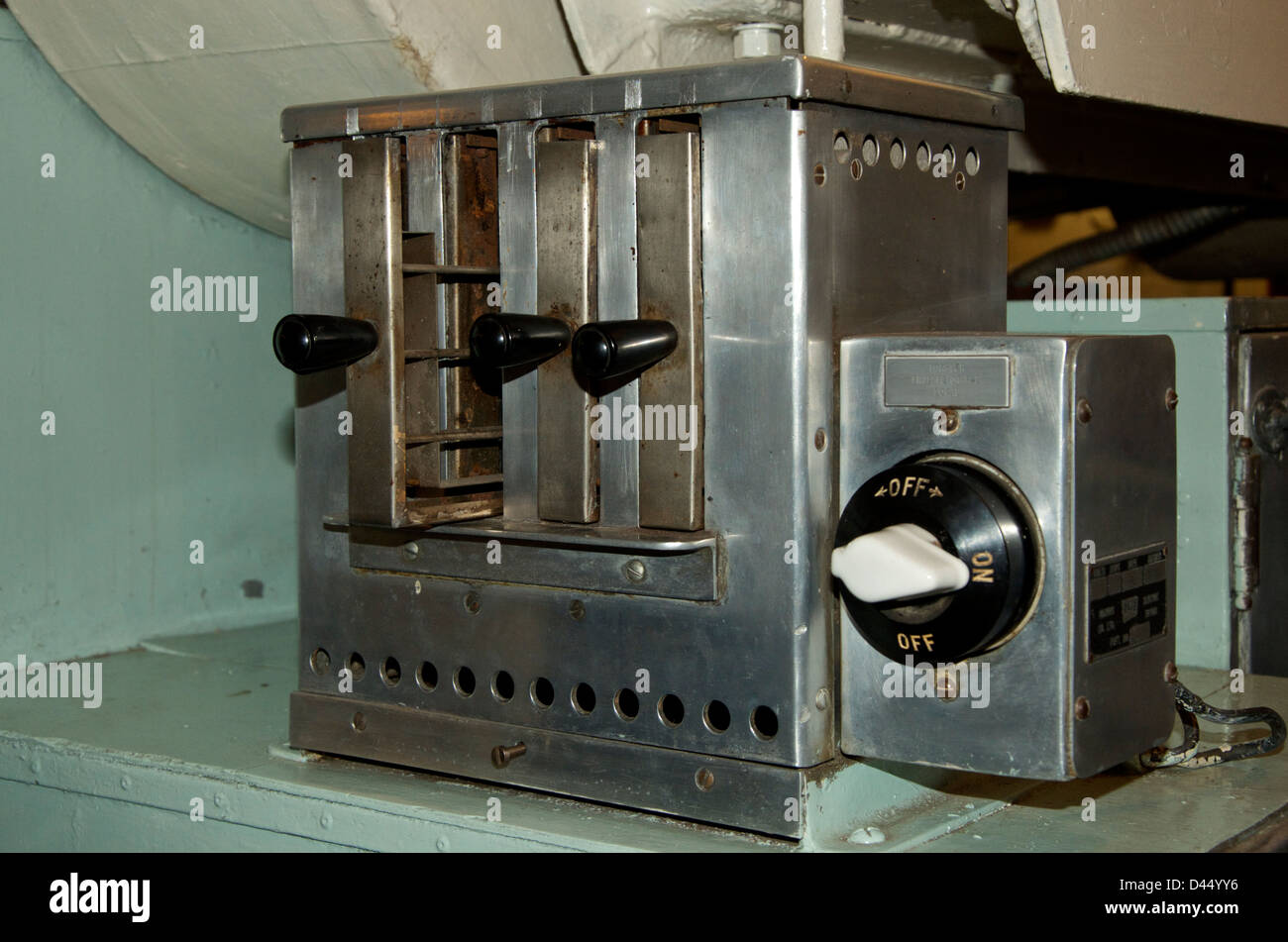 An Electric bread toaster in the mess on board HMS Cavalier at Chatham ...